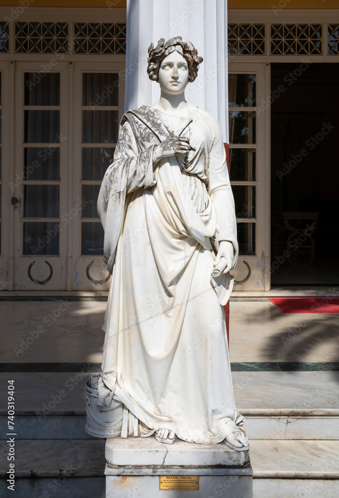 Marble statue of muse Thalia, the protector of comedy, in the Courtyard ...