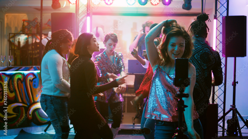 Happy girl recording vlog for internet, using mobile phone at ...