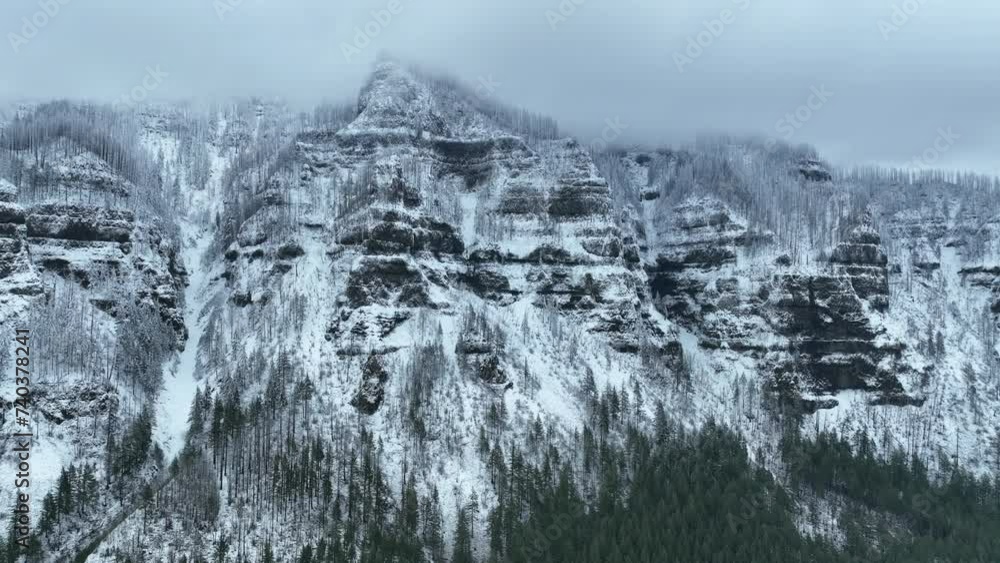 Snow covers the rugged mountain landscape in the Columbia River Gorge ...