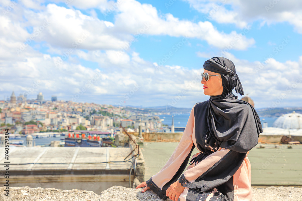 From Suleymaniye Mosque, Islamic woman in traditional Arab hijab dress ...