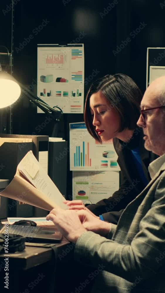 Vertical Video Private agents reading classified records to uncover new case clues, team ...