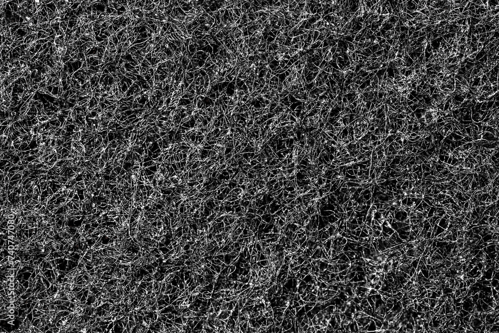 Dark abstract background and pattern of interwoven hairs, fibers and ...