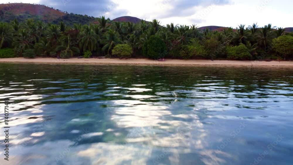 Aerial low pass 4k cinematic view of fishing boats and shores of Ocam ...