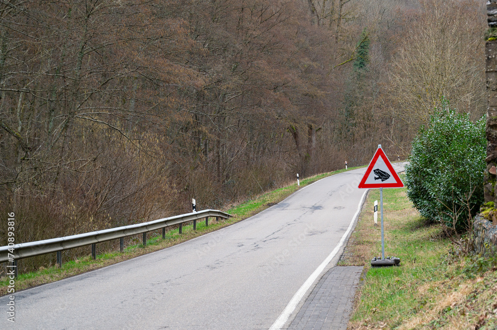 Toad crossing to spawning ground road sign, warning mating season of ...