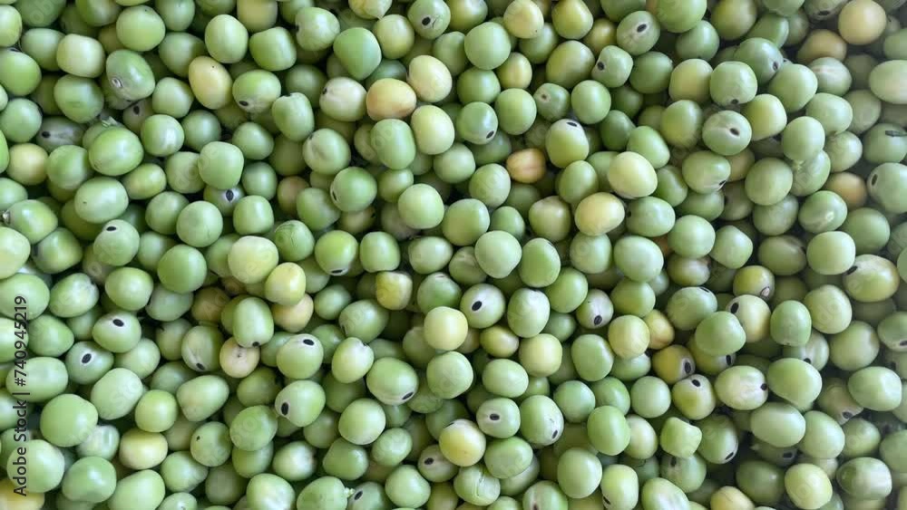 Green peas background with dark spot. 4k video. Backgrounds and ...