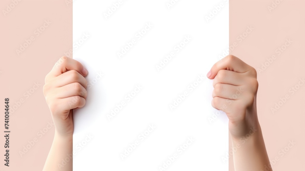 The image shows a close-up of a person's two hands with a pale ...