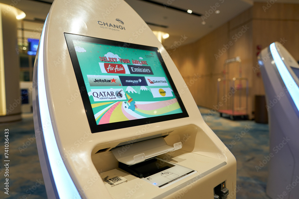 SINGAPORE - NOVEMBER 06, 2023: close up shot of self-service check-in ...