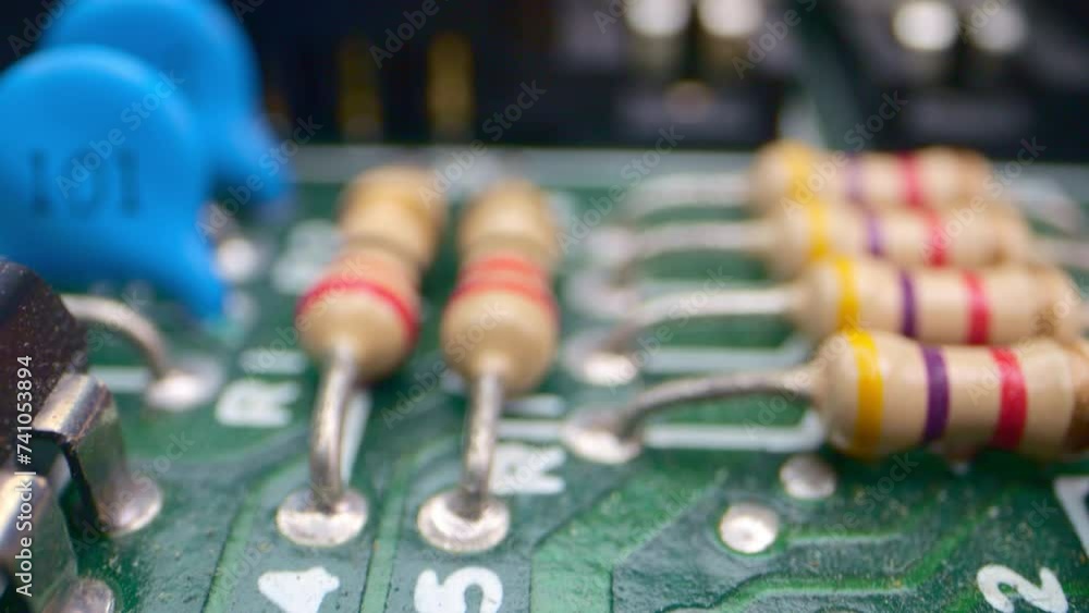 A close examination of a circuit board's surface, highlighting the ...