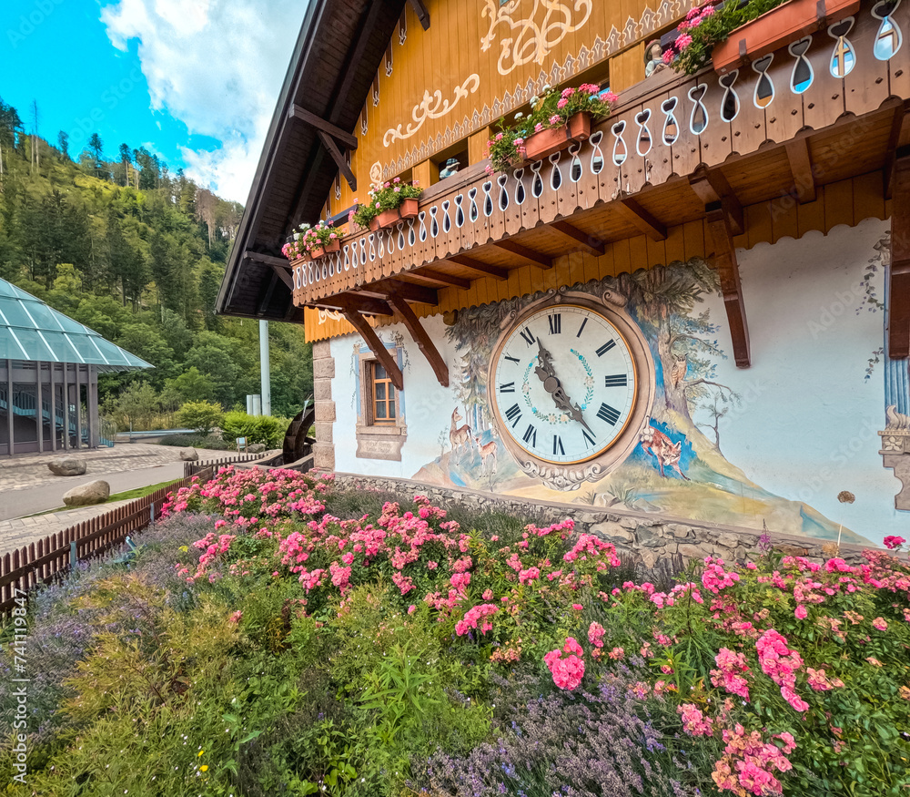 Charming German Bavarian style chalet with large cuckoo clock face on ...