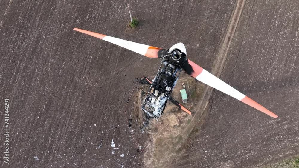 Close-up of a burnt out wind turbine. Wind energy farm turbine ...