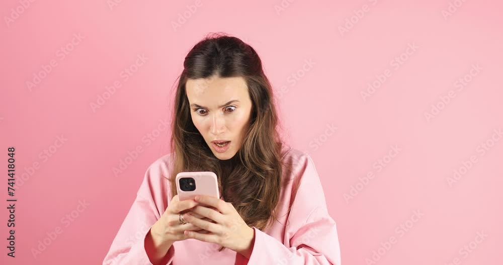 Shock, omg angry woman with phone on pink background for notification ...