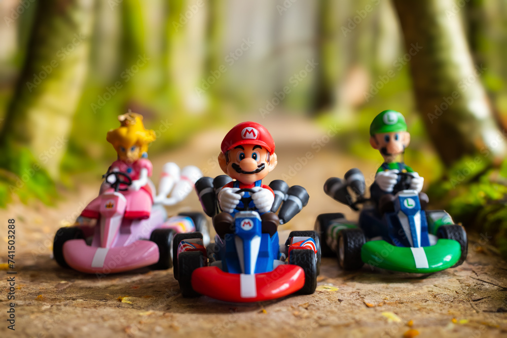 Super Mario, Luigi and Princess in karts - racing toy Stock Photo ...