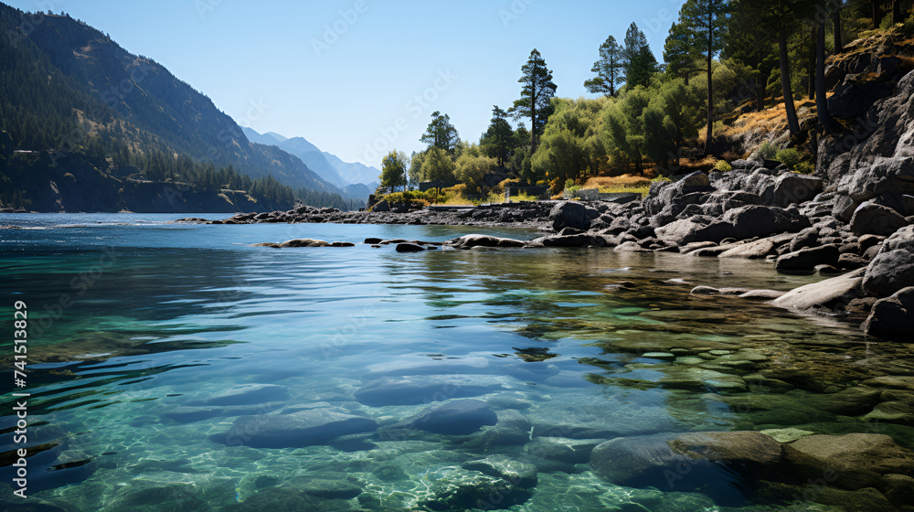 A secluded mountain lake surrounded by rocky cliffs, with clear blue ...