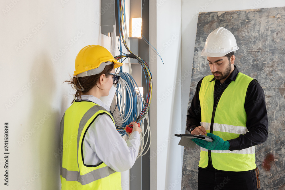 team electrical engineers or technicians is professionally inspecting ...