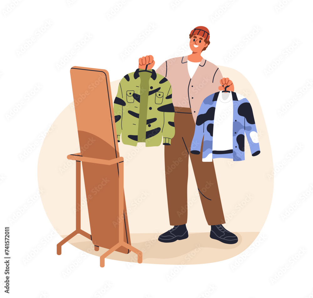 Stylish young man choosing outfit, holding shirts. Fashion stylist ...