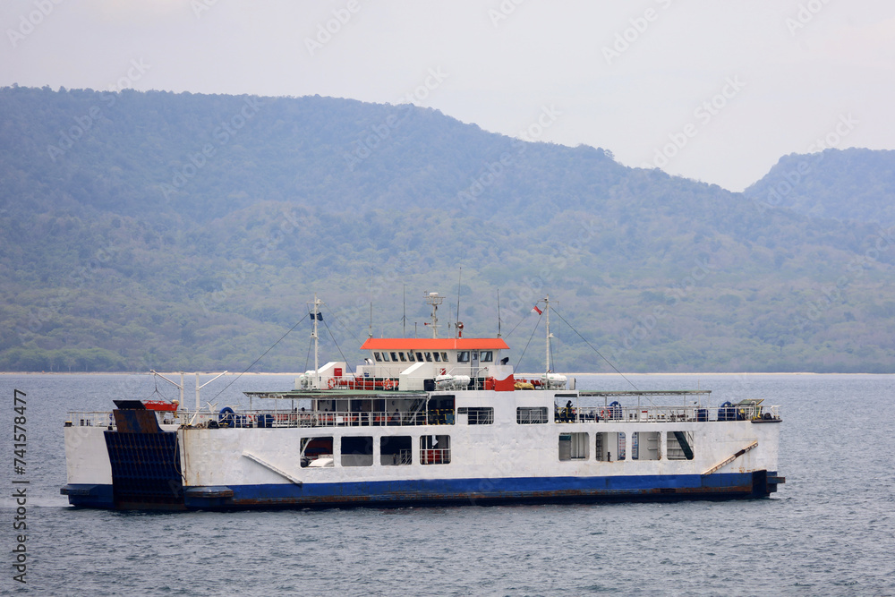Ferries sail on the sea, ferries in the Bali Strait as a means of ...