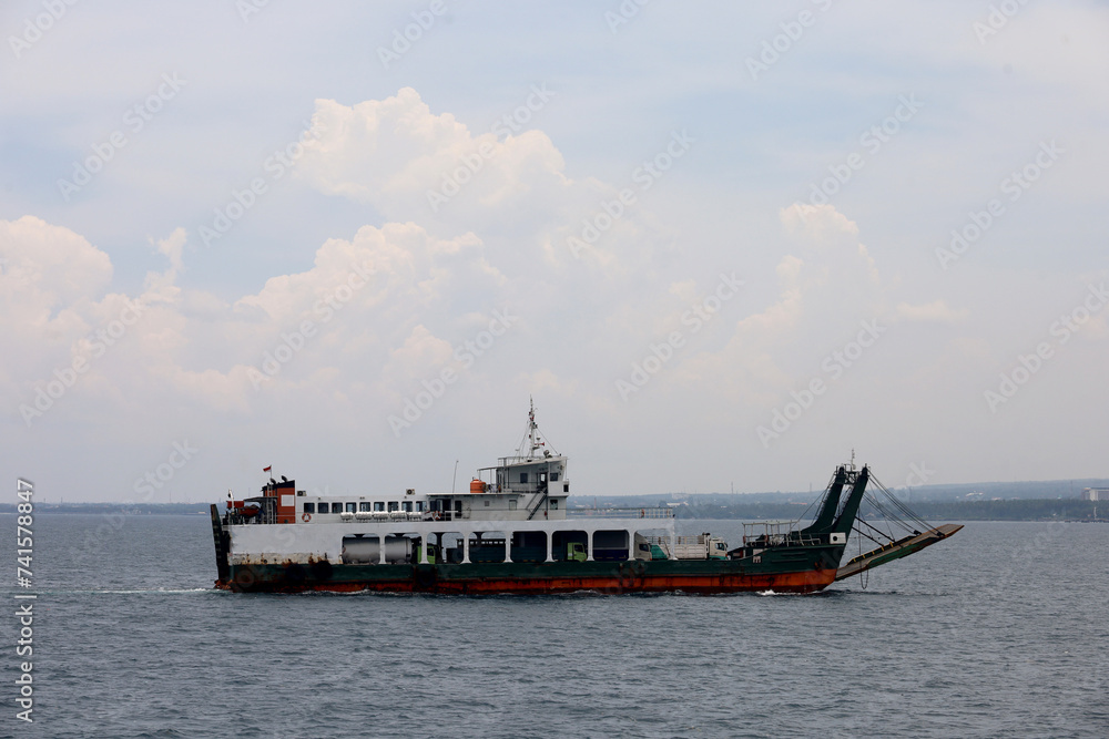 Ferries sail on the sea, ferries in the Bali Strait as a means of ...
