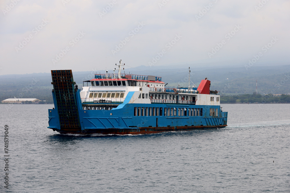 Ferries sail on the sea, ferries in the Bali Strait as a means of ...