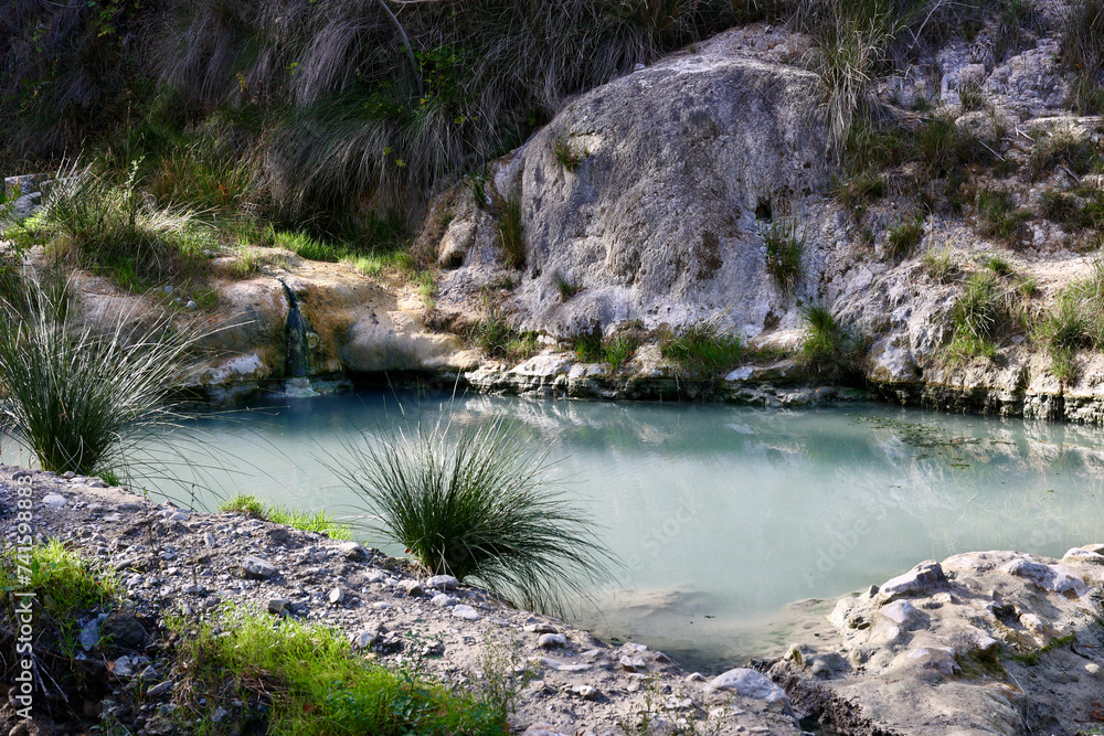 Bagni San Filippo is a small hot spring containing calcium carbonate ...