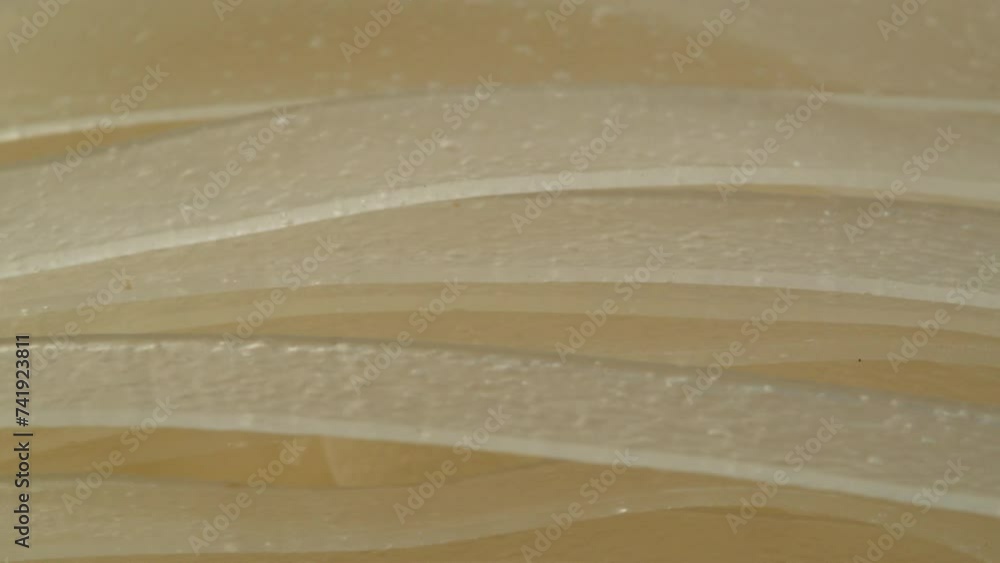 Close-up of instant noodles texture. Asian fast food with meat and ...