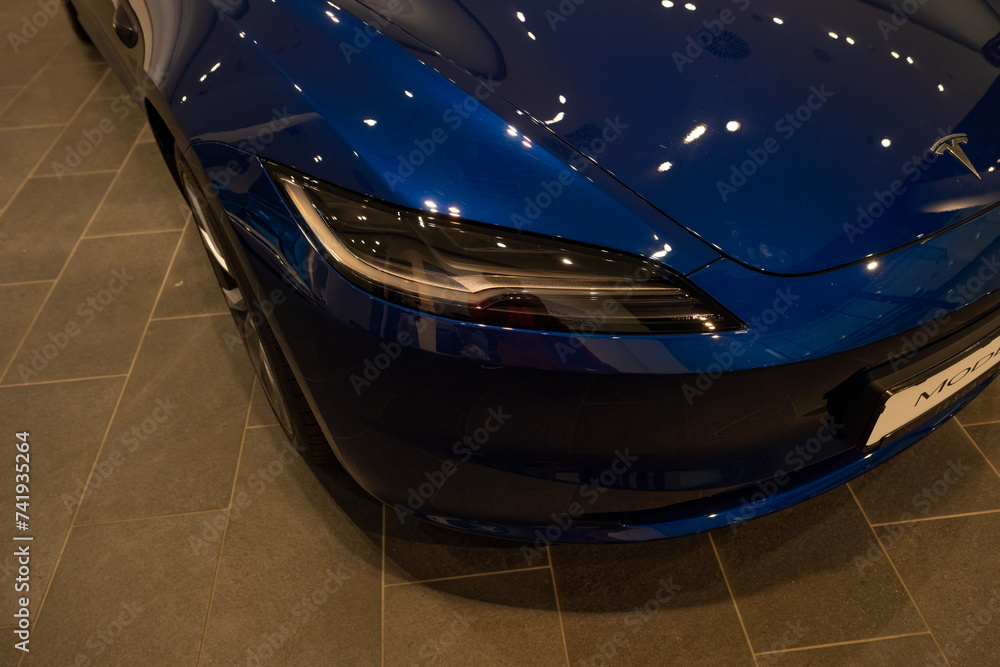 blue Tesla Model 3 Highland facelift electric car in Studio, eco ...