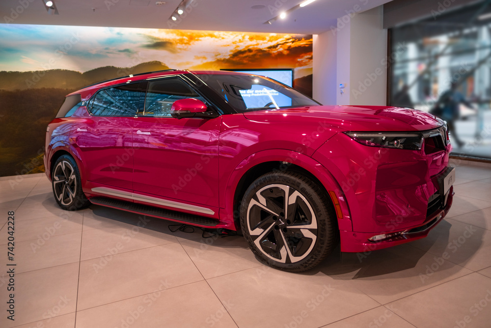 new red Vinfast vf 9 electric SUV in Studio, advanced technologies in ...