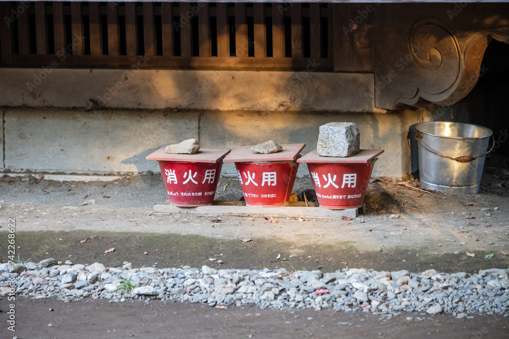 Tokyo, Japan, 3 November 2023: Traditional Japanese fire buckets lined ...
