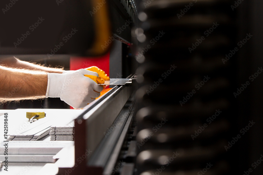 Operator bending metal sheet by sheet bending machine Stock Photo ...