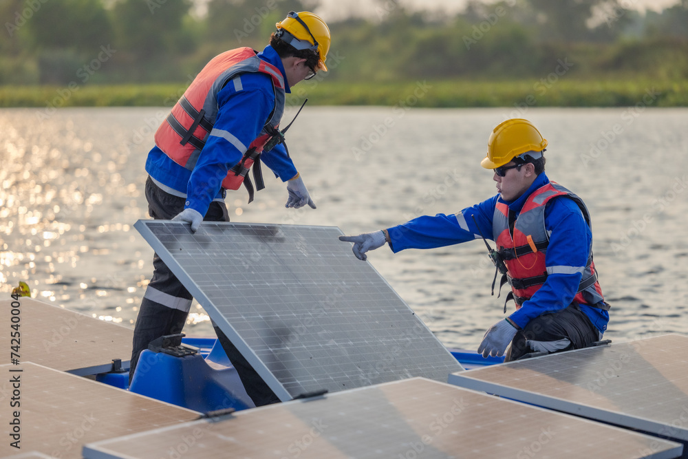 Engineers inspect the structural stability and alignment of floating ...