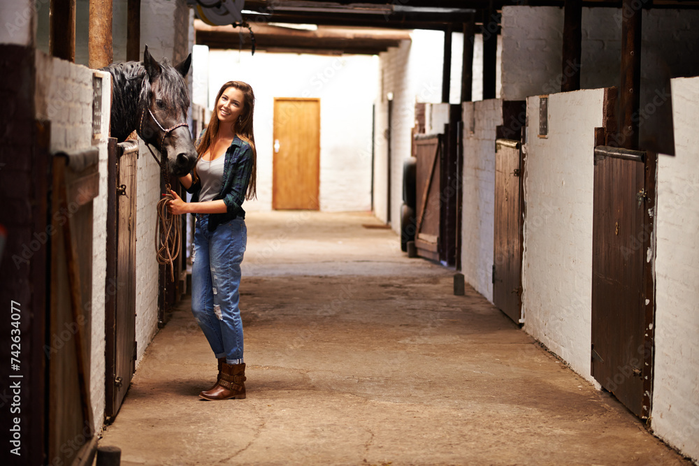 Woman, portrait and happy with horse in stable for bonding, sports ...