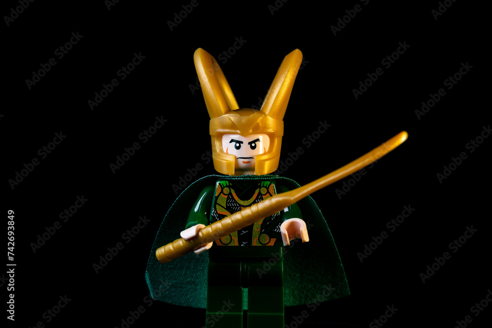 LEGO Marvel's Loki in dark green cloak with the long sword in his hand ...
