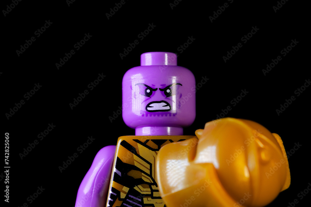 LEGO Marvel's Thanos with angry face and yellow helmet in his hand ...