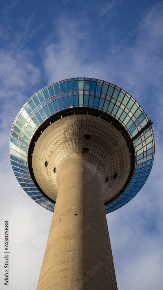 Dusseldorf Rheinturm TV tower. Rhine tower is a striking landmark Stock Photo | Adobe Stock