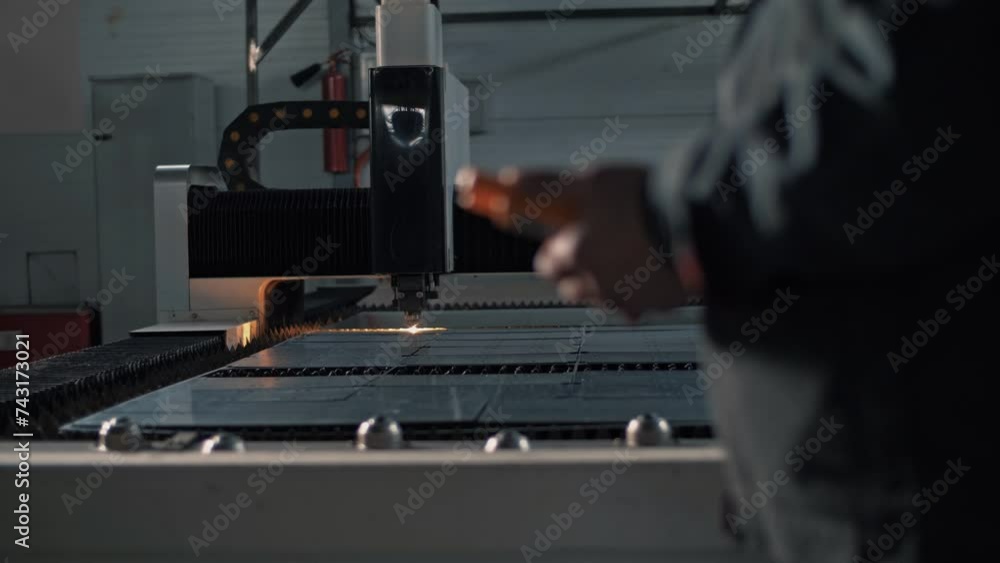 Controlling a CNC laser cutting machine by remote control in an industrial plant Stock-Video ...