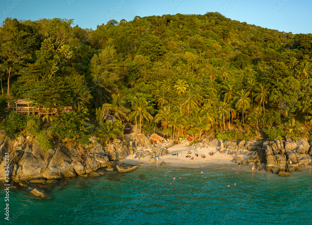 Freedom Beach has a small beach separated by large rocks at the end of ...