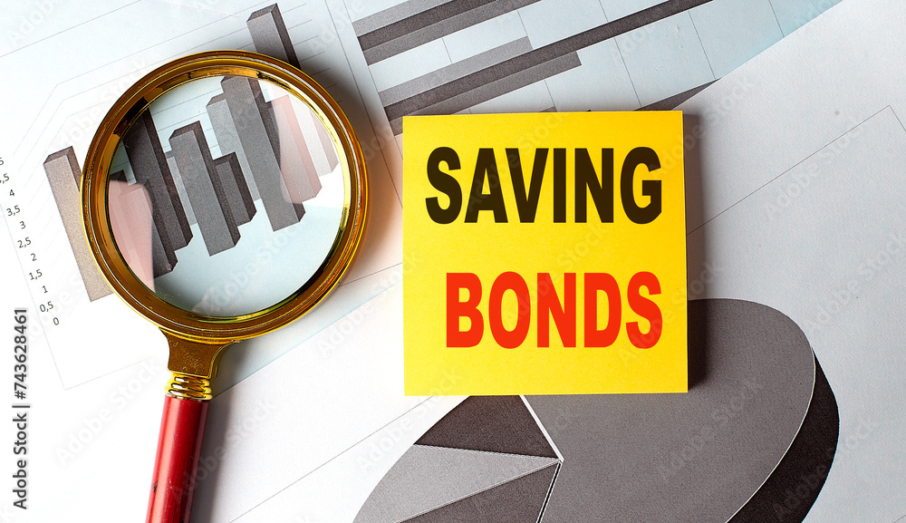 SAVING BONDS text on a sticky on chart Stock Photo | Adobe Stock