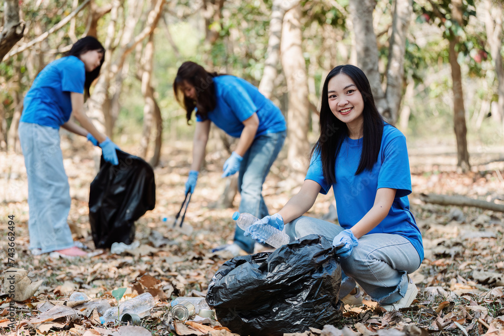 Group of volunteers, community members cleaning the nature from garbage ...