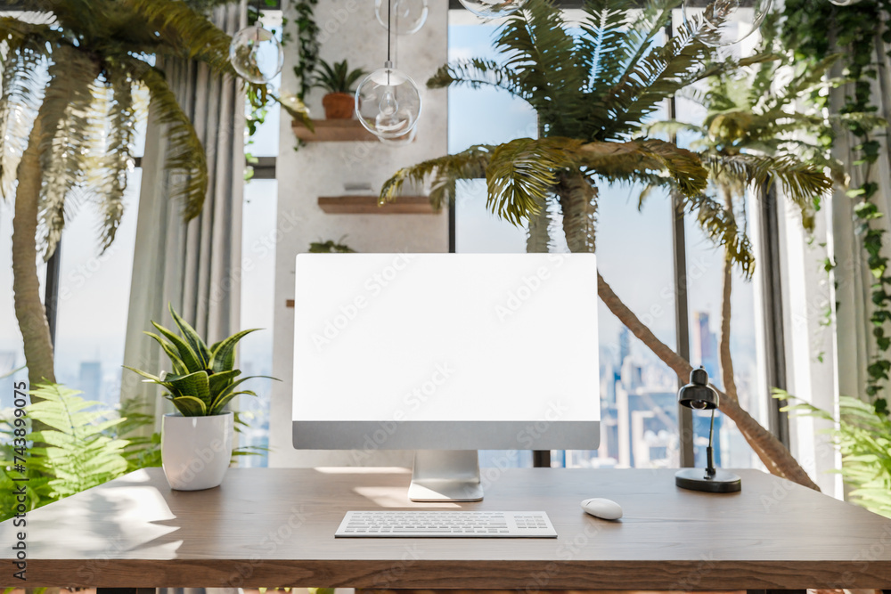frontal view on modern pc workplace in indoor jungle environment; white ...
