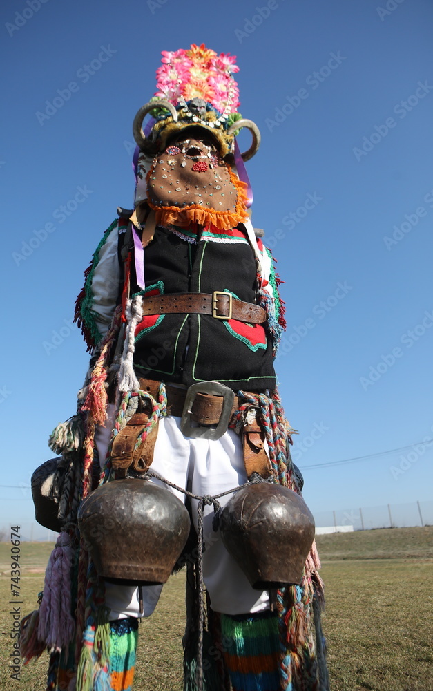 People called Kukeri parade in masks and ritual costumes, perform ...