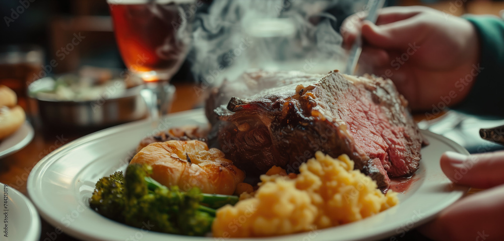 Steaming hot roast beef dinner with shrimp, mashed potatoes, and ...