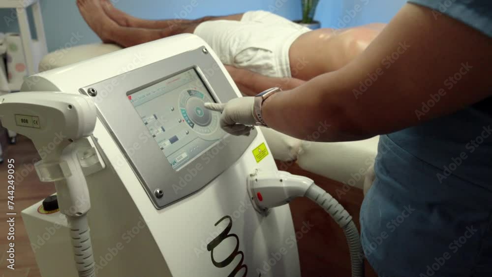 Laser gun hair removal equipment at wellness center clinic beauty salon ...