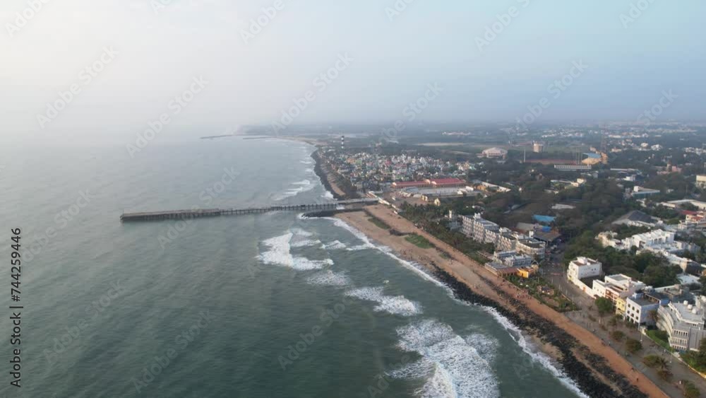 Drone footage approaching the city from the sea. The whole of ...