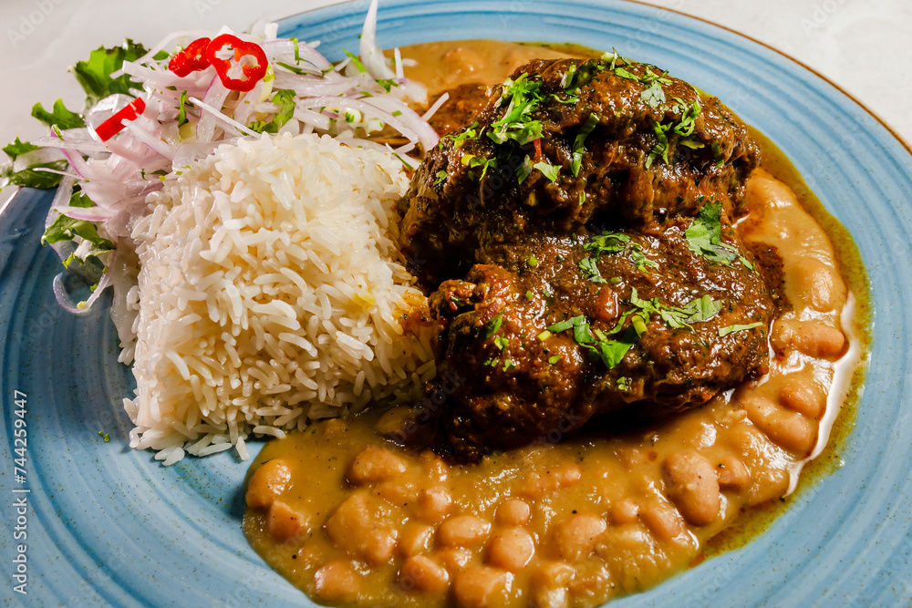 Beef stew with spices and beans with white rice (beef stew with beans ...