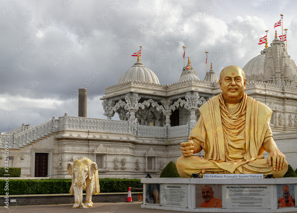 London, UK - Feb 23, 2024 - The gold colored statue of spiritual leader ...