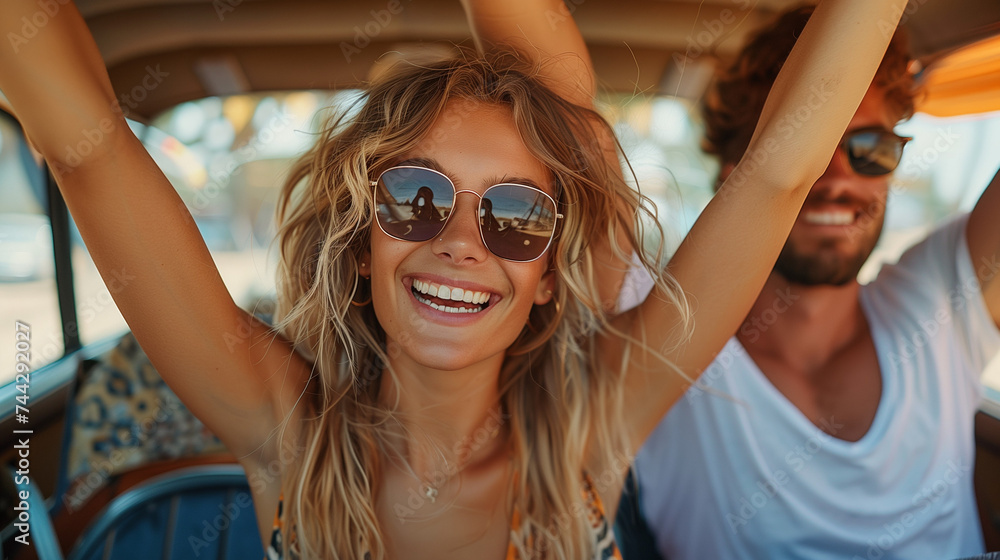 Happy couple enjoying a long drive in a car. Friends going on a road ...