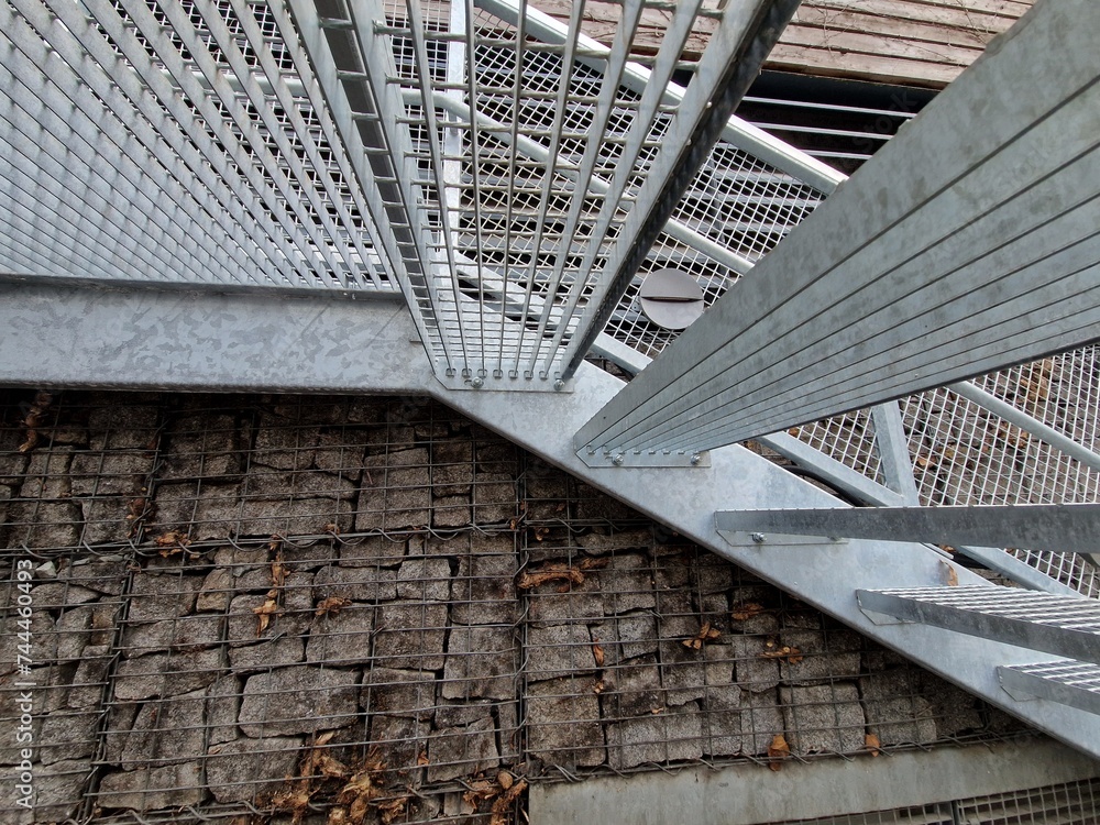 industrial hall, warehouse has a side door at a steep staircase with ...