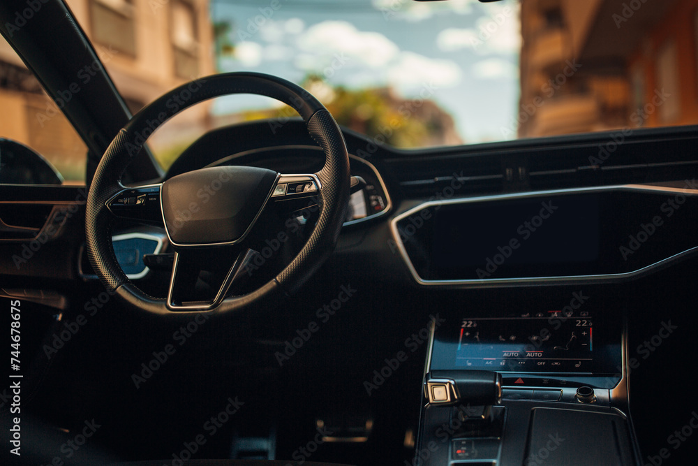 Modern supercar interior with leather panel, sport seats, multimedia ...