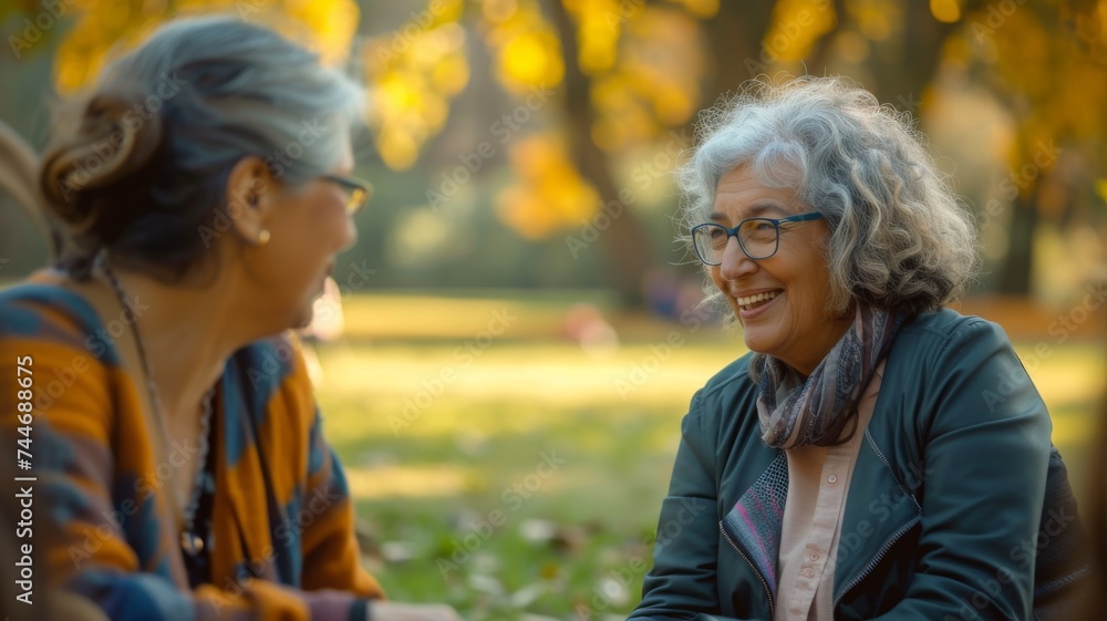 Comedy, laughing and senior woman friends walk outdoor nature park ...