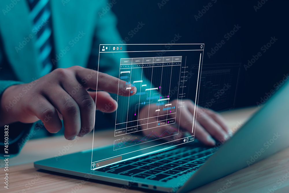 Businessman shows work project plans and updates work by planning ...