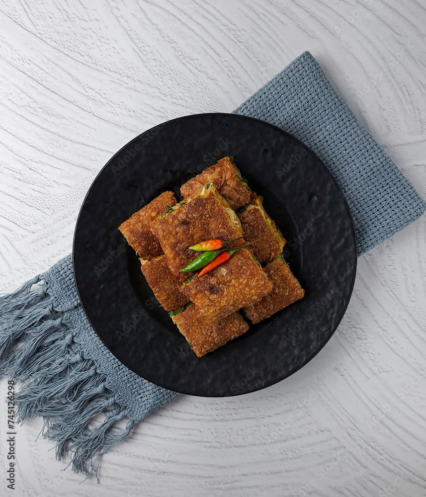 Murtabak or Motabbaq is a stuffed pancake or pan-fried bread which is ...